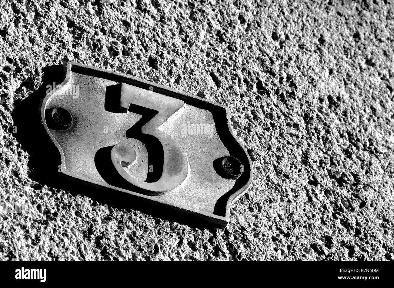 Stock photo of a number 3 house sign taken in black and white Stock ...
