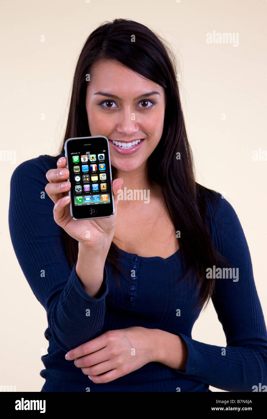 Girl with iphone / ipod touch Stock Photo - Alamy