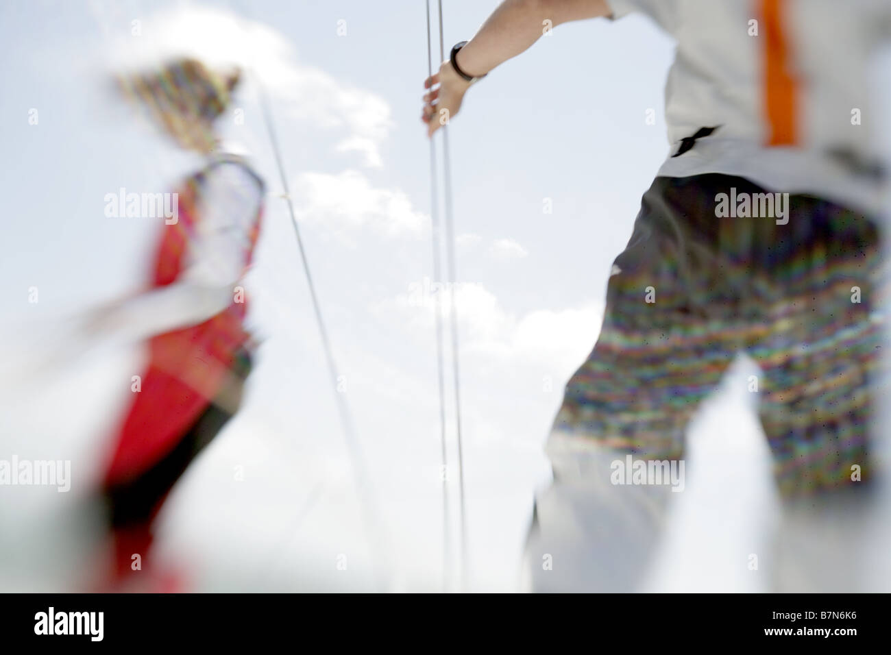 2 sailors sailing a yacht Stock Photo - Alamy