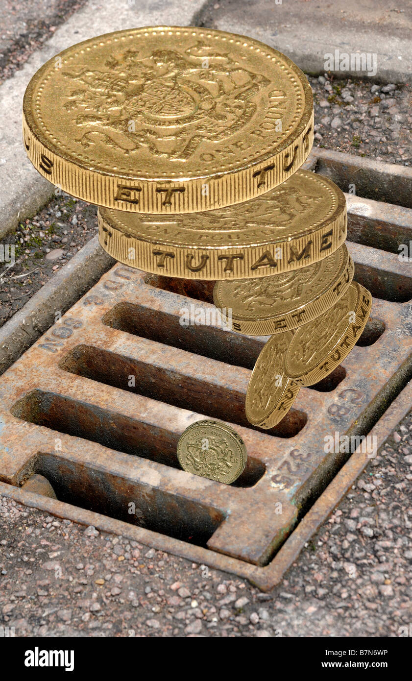 money down the drain Stock Photo - Alamy