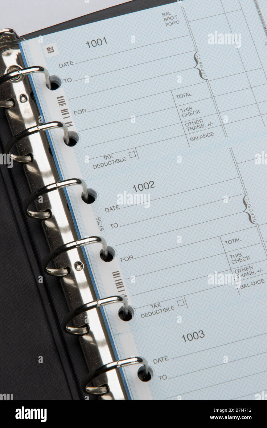 business checks in binder Stock Photo - Alamy