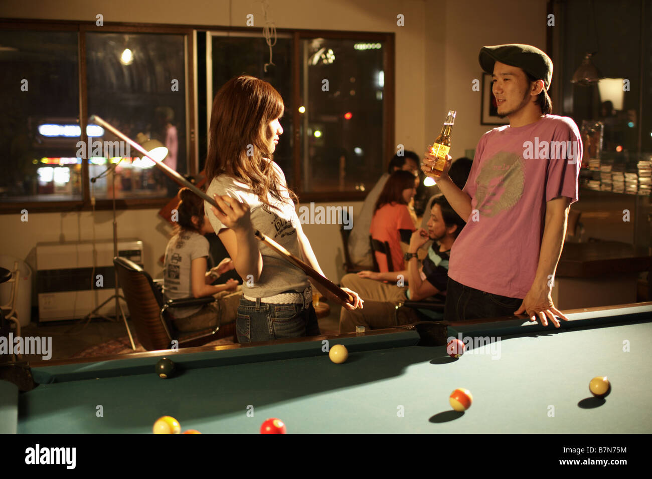 Couple Playing Pool Stock Photo - Alamy