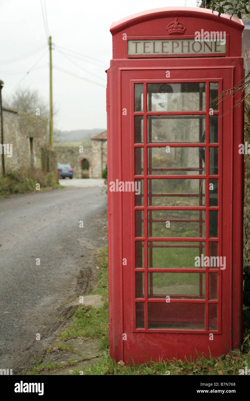 A shot of an old style red phone box once popular in the UK Stock Photo ...