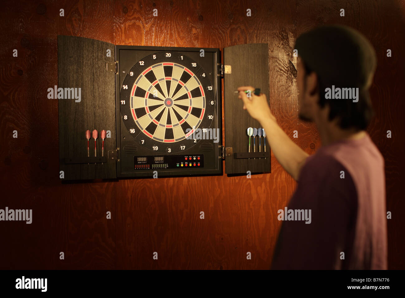 Dart board inside man hi-res stock photography and images - Alamy