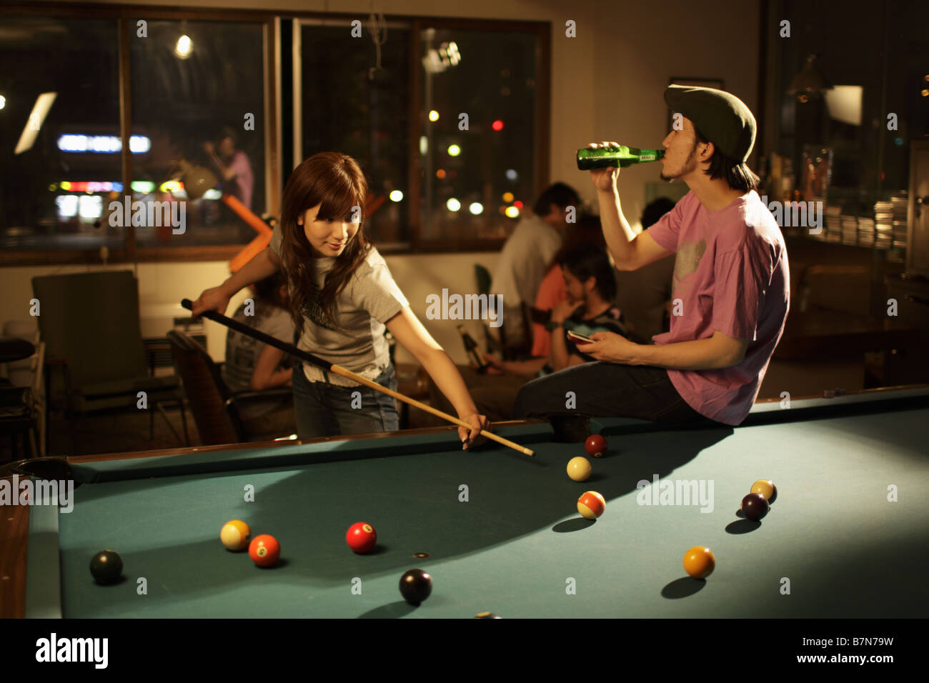 Young couple beer ball hi-res stock photography and images - Alamy