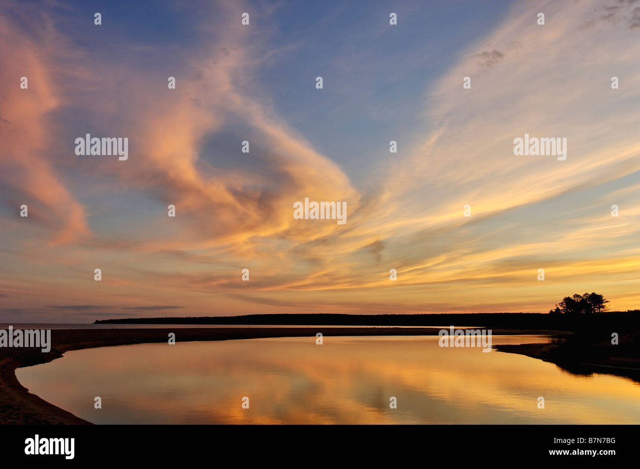 Sunrise Reflected on Au Train River where it Flows into Au Train Bay on ...