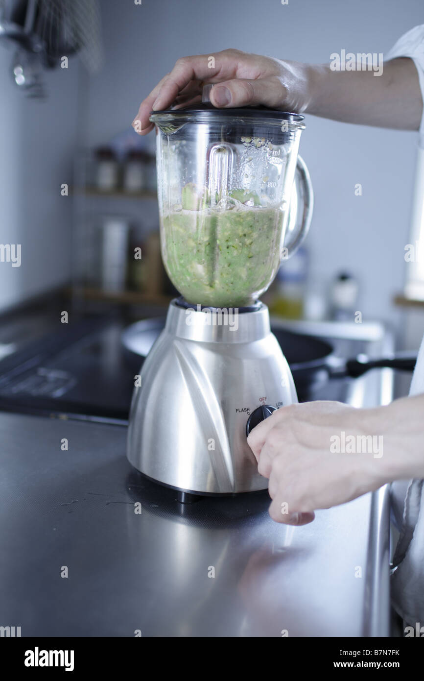 Man in Kitchen Making Drinks Stock Photo - Alamy