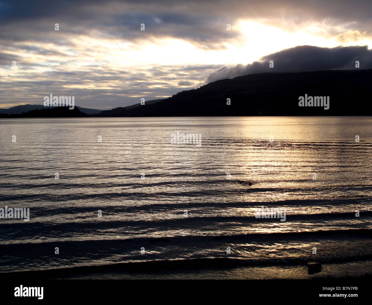 Sunset over Luss Loch Lomond Scotland Stock Photo - Alamy
