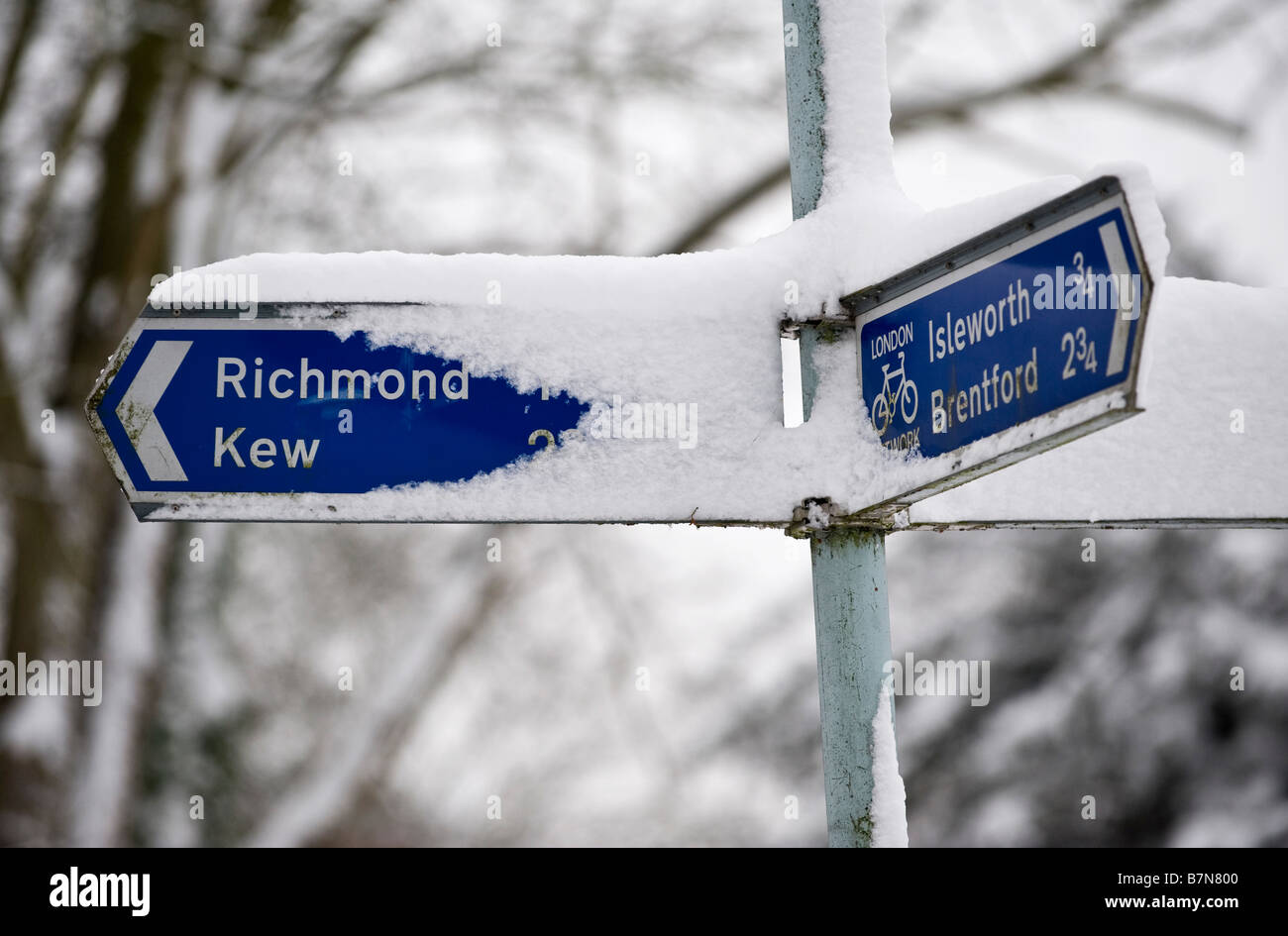 Partially covered sign hi-res stock photography and images - Alamy
