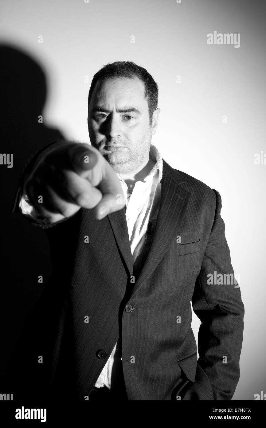 Pointing finger in white Black and White Stock Photos & Images - Alamy