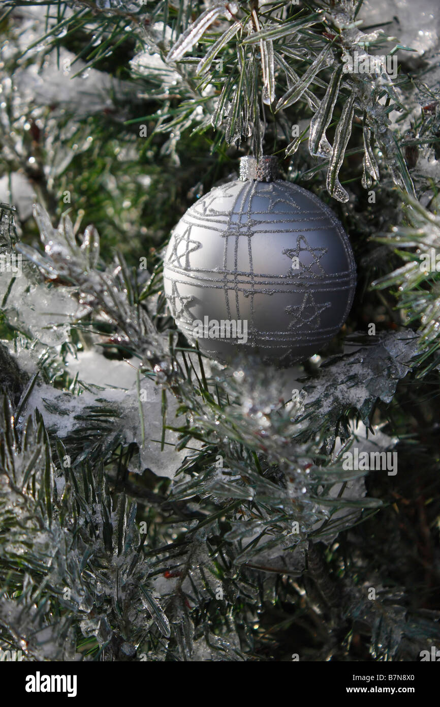 Christmas tree with one a silver ball ornaments outdoor decor in the ...