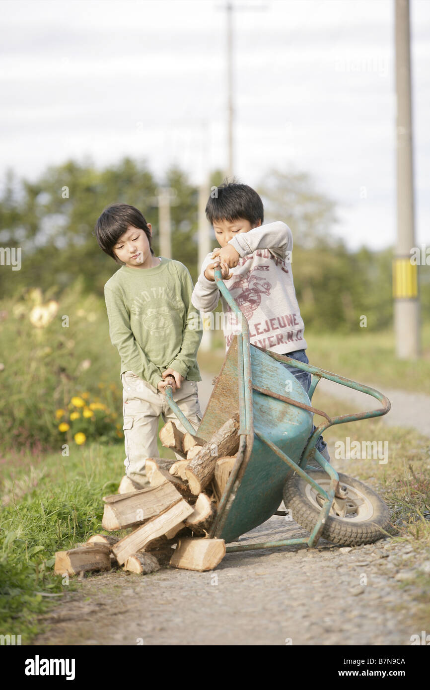 Two boys lean hi-res stock photography and images - Alamy