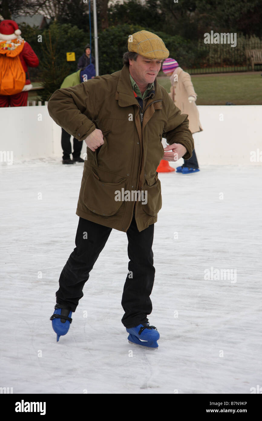 male man ice skating skaters rink open air cold winter wonderland hyde ...