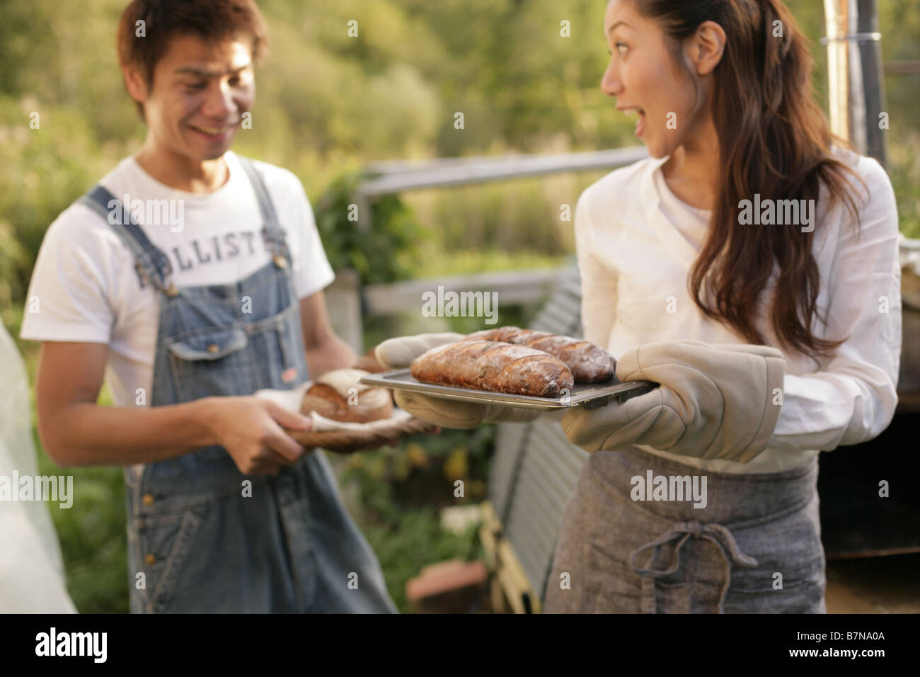 A couple baking home-made bread Stock Photo - Alamy