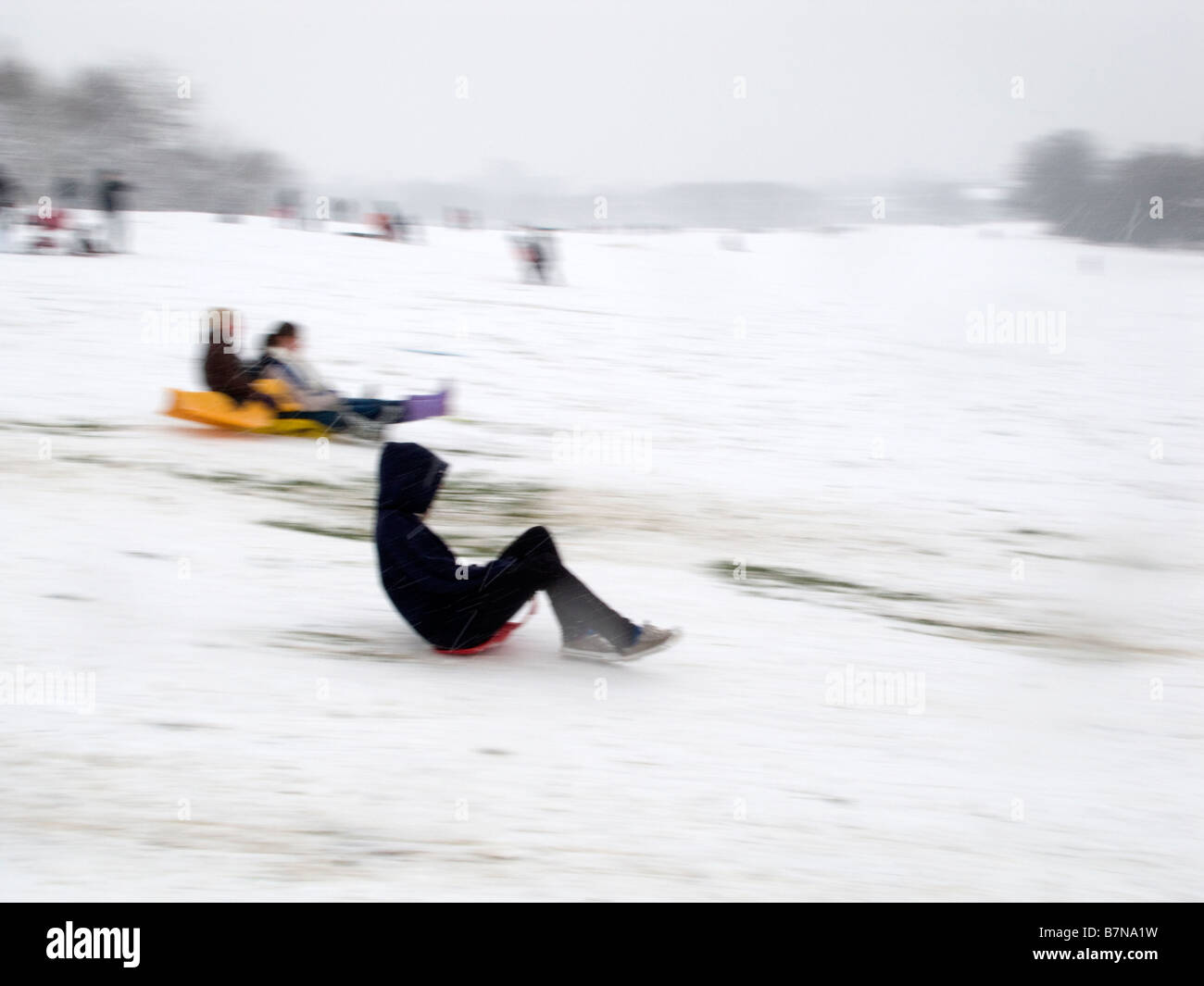 Sledging snow hi-res stock photography and images - Alamy