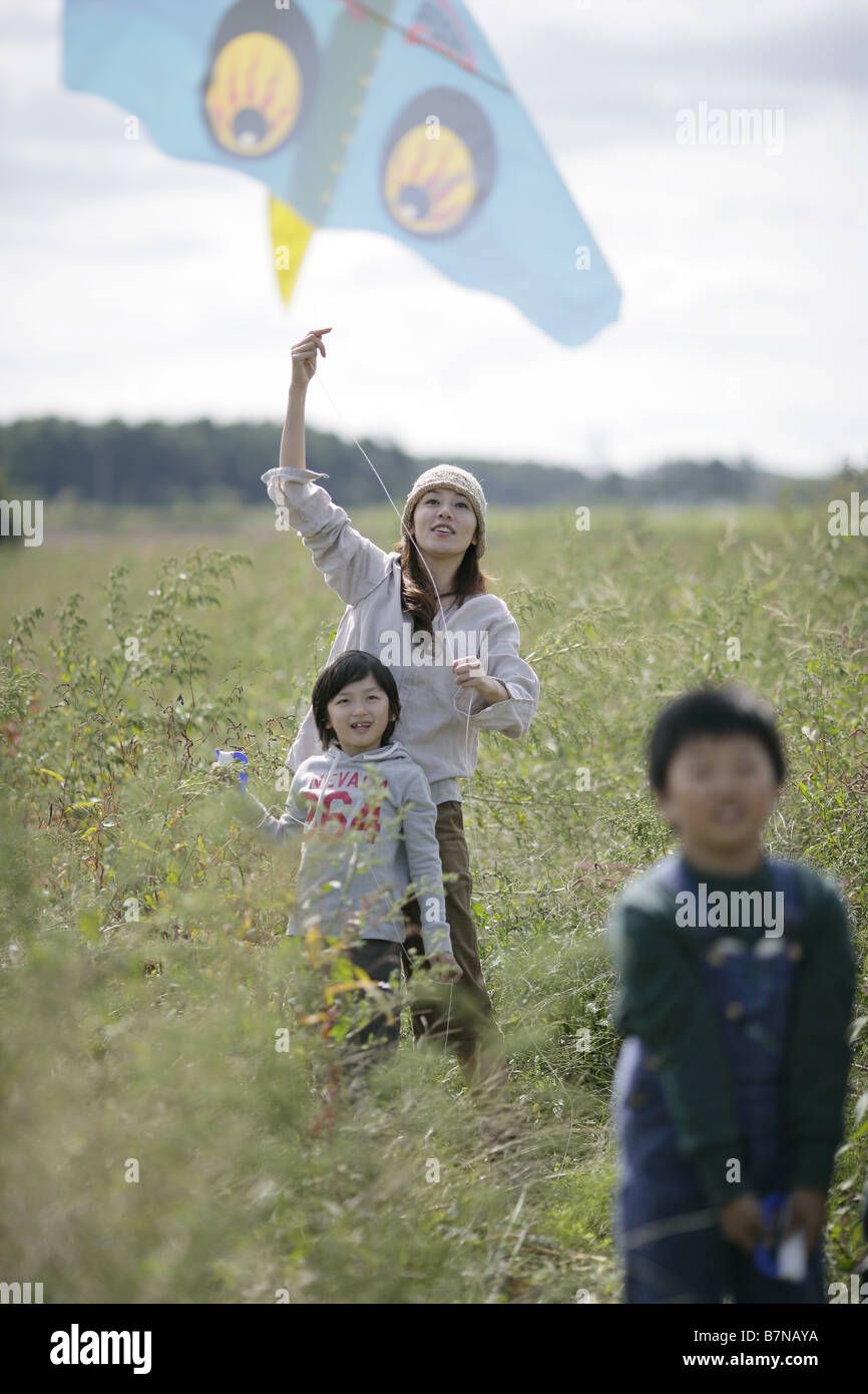 Children with kite hi-res stock photography and images - Alamy