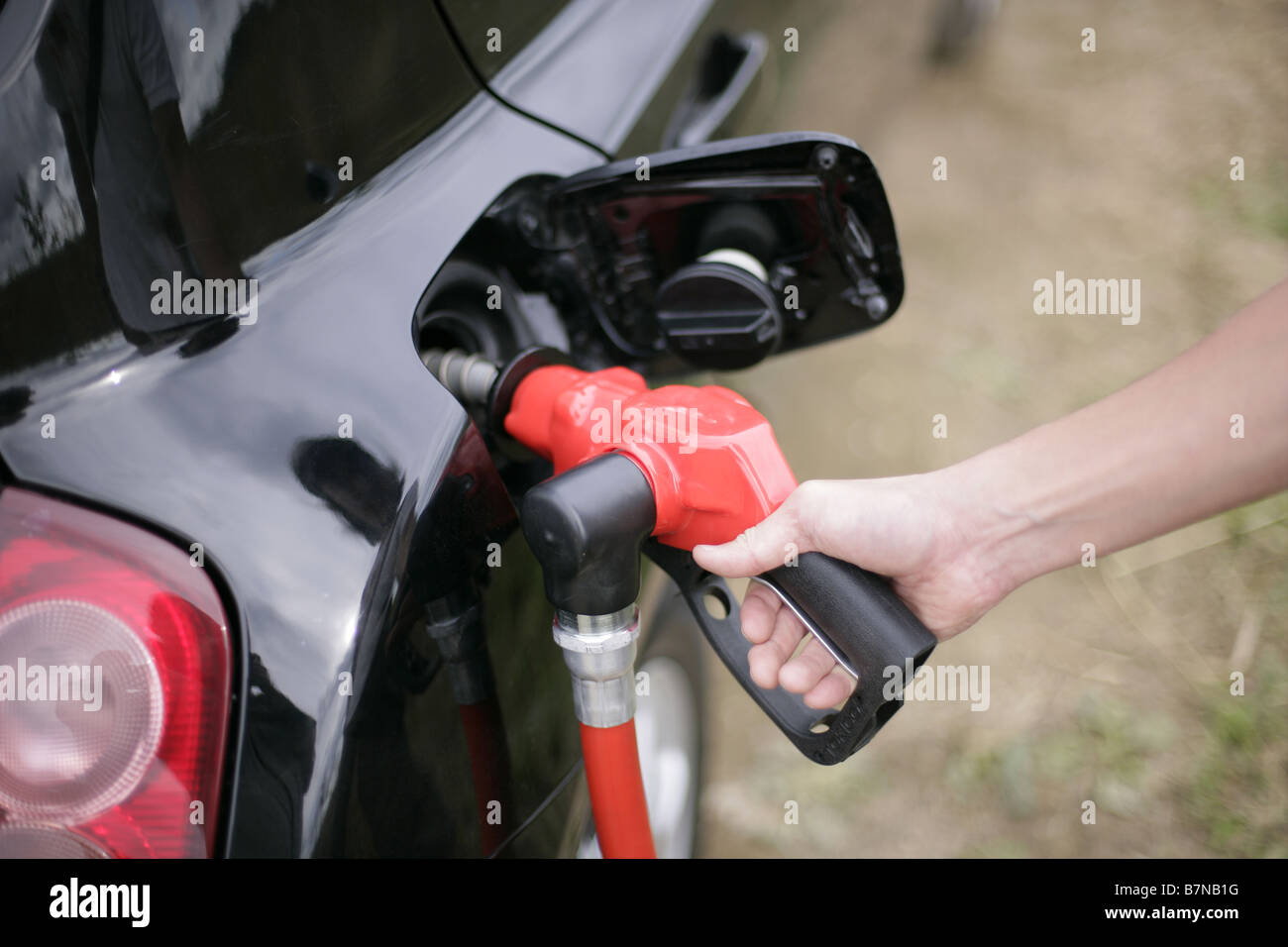 Red hand pumps hi-res stock photography and images - Alamy