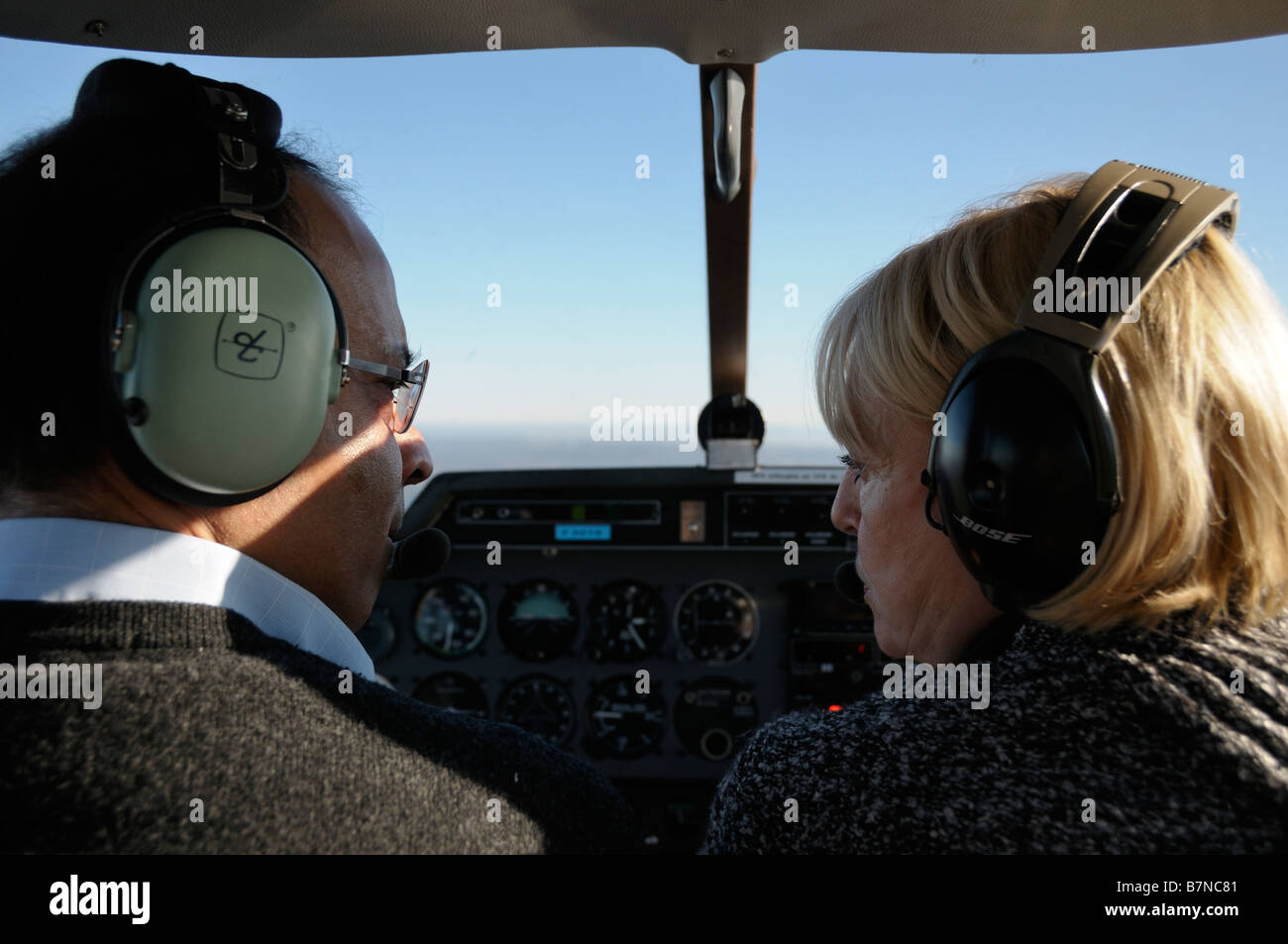 Stock photo of a pilot and his intstructor having a conversation in the ...