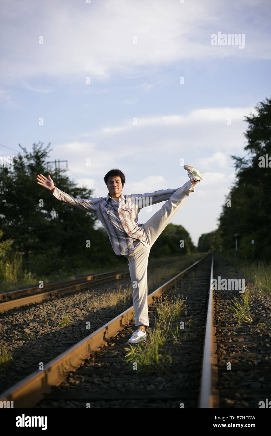 A man on the railway track Stock Photo - Alamy