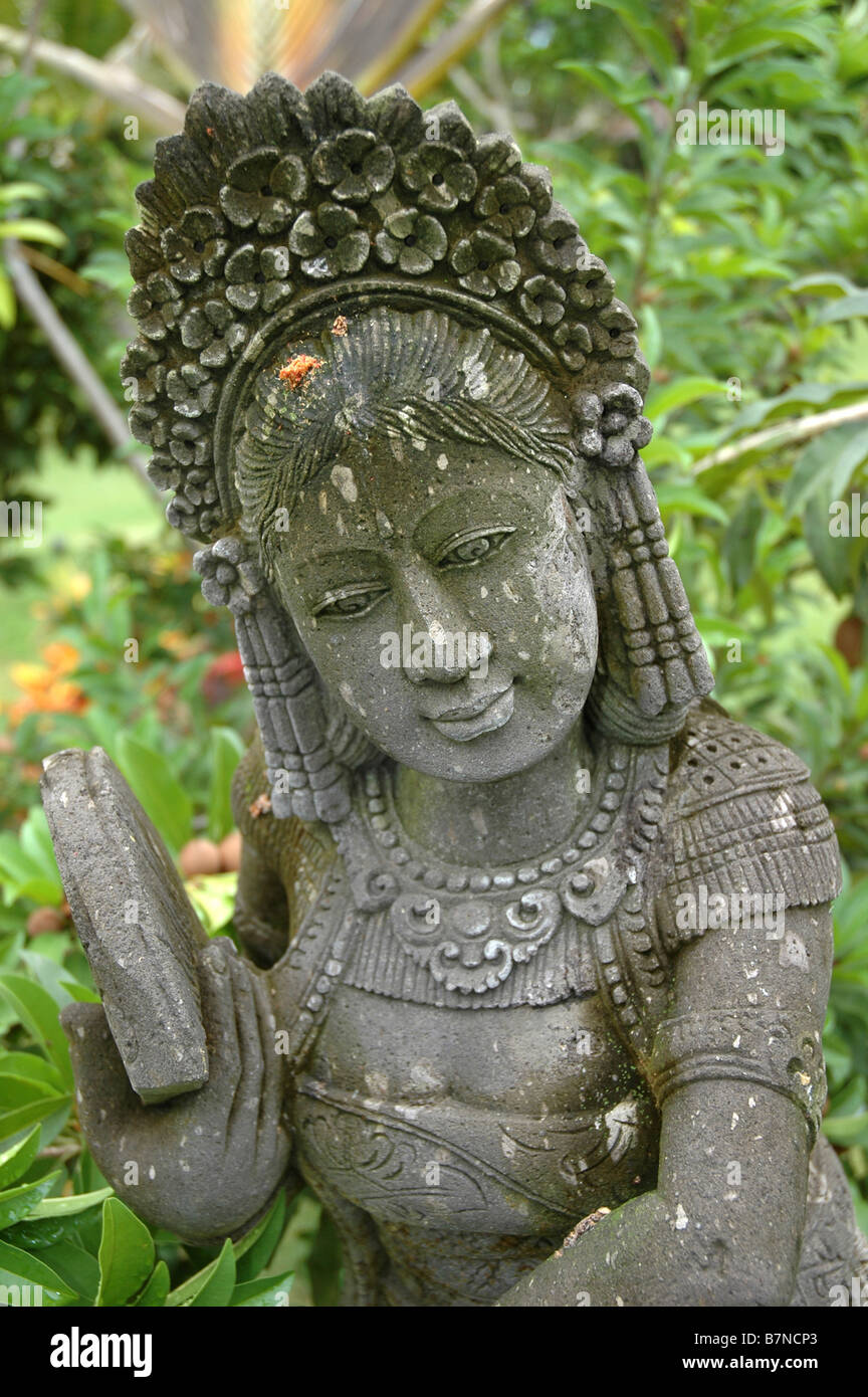 A stone statue of an apsara in Ubud, Bali, Indonesia Stock Photo - Alamy