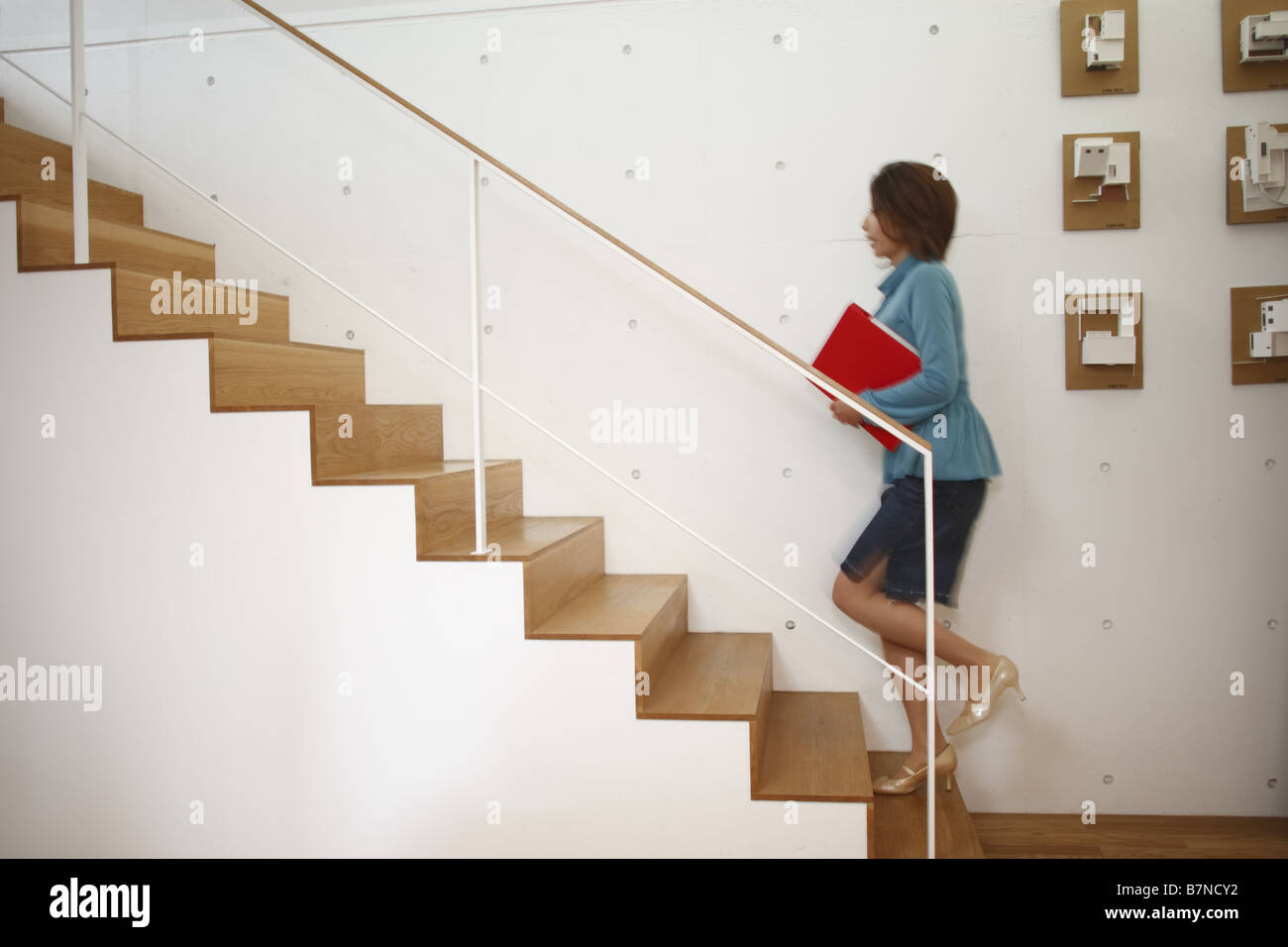 Up stairs woman skirt hi-res stock photography and images - Alamy