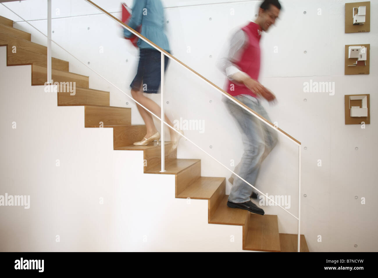 Men climbing down stairs hi-res stock photography and images - Alamy