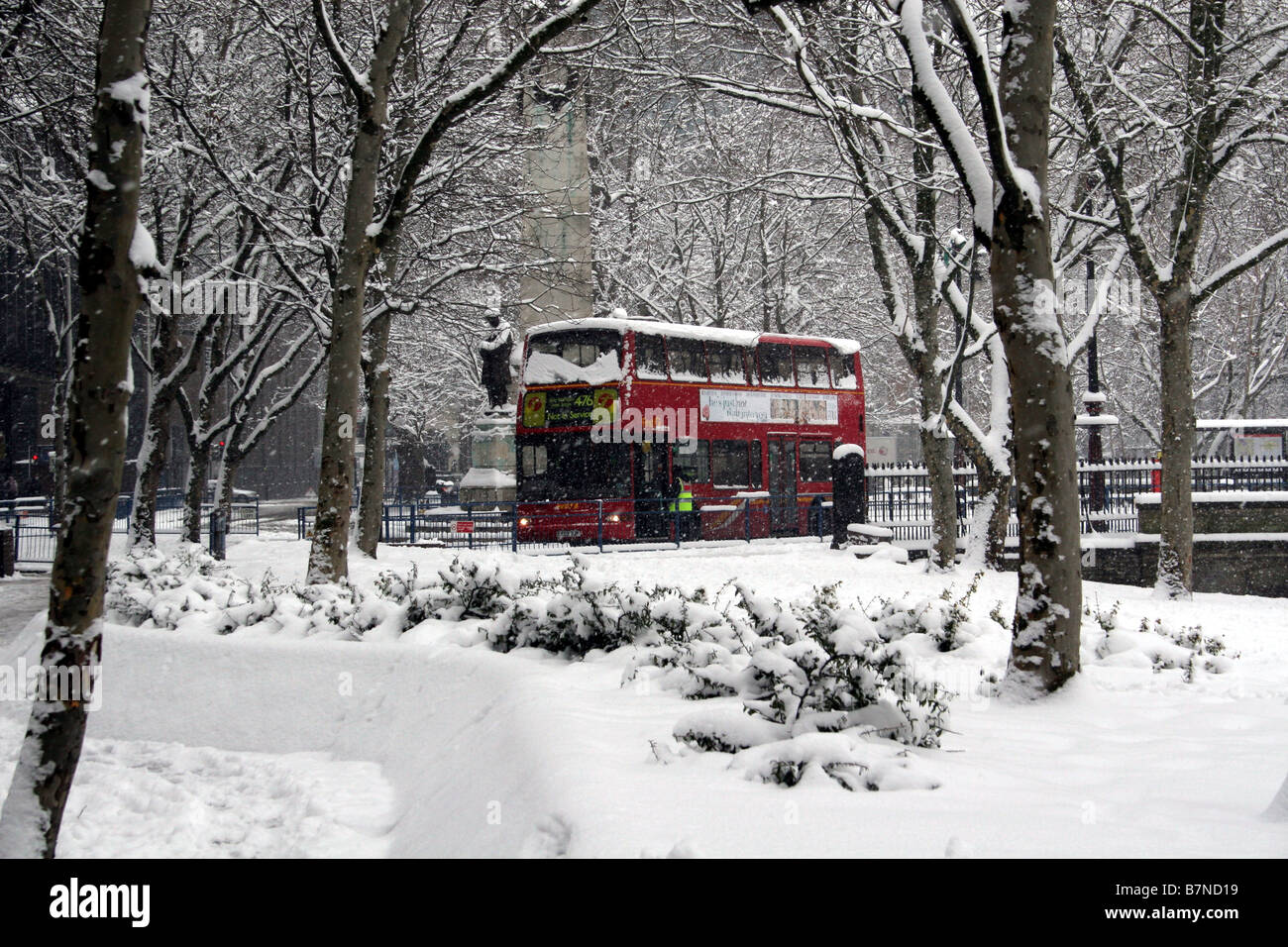 Red london bus in snow hi-res stock photography and images - Alamy