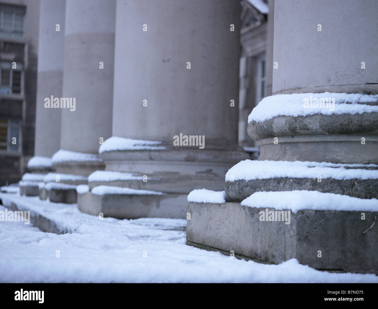 Snow covered columns at the front of Leeds Town Hall Stock Photo - Alamy