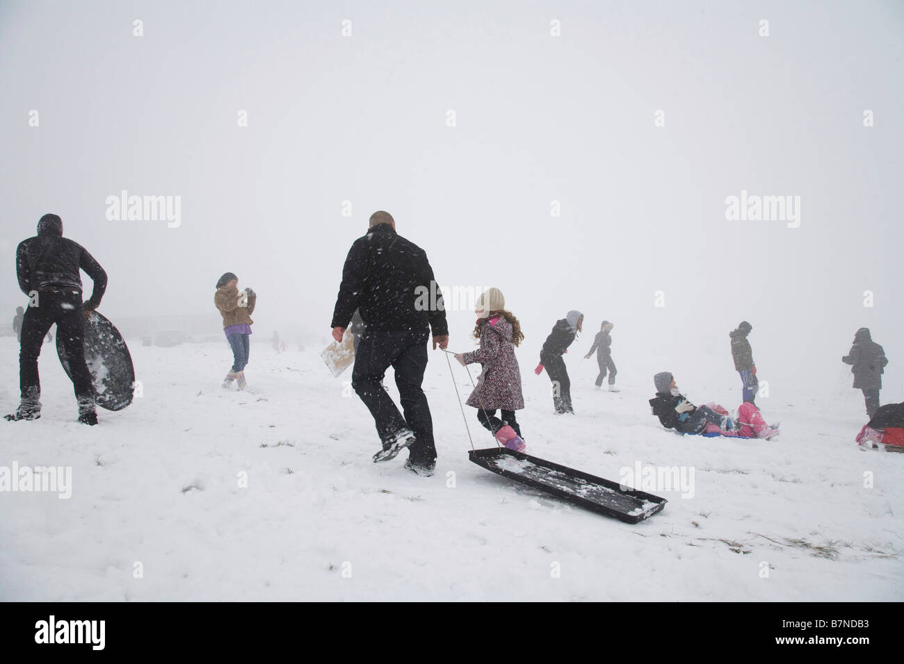 Sledging snow hi-res stock photography and images - Alamy