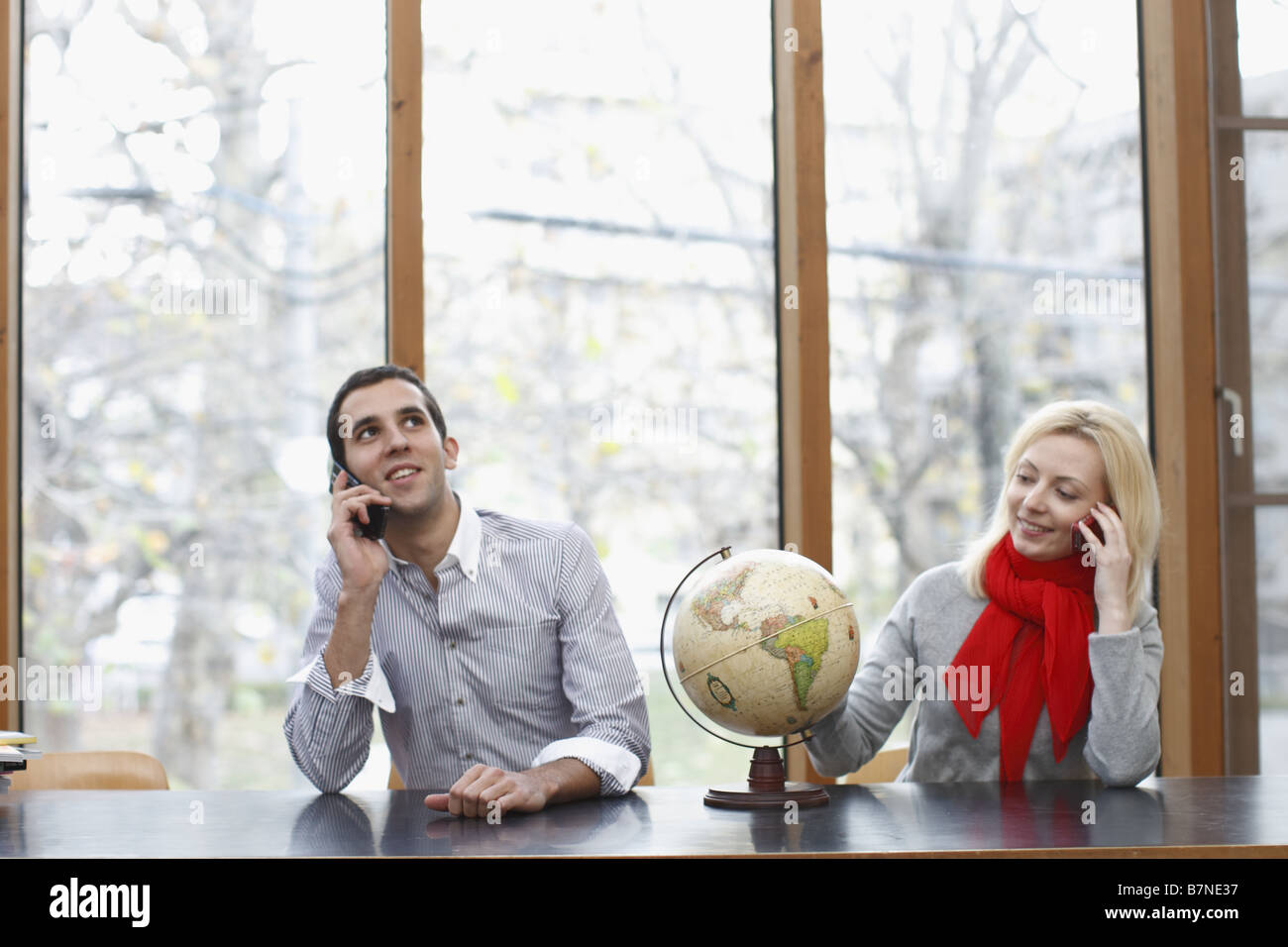 Mobile phone globe in hi-res stock photography and images - Alamy