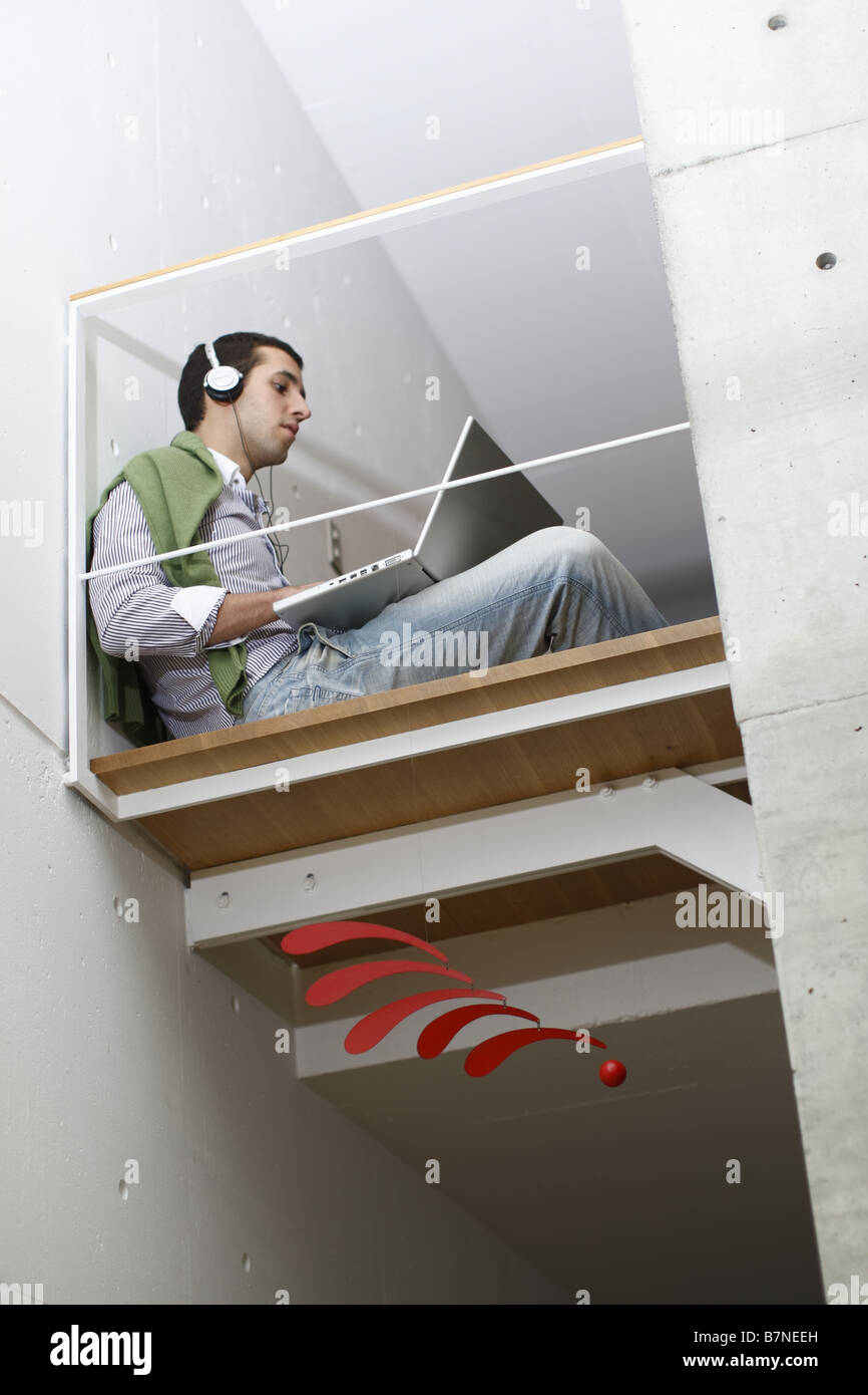 Man using a laptop Stock Photo - Alamy