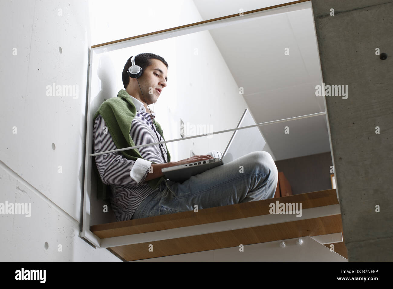 Man using a laptop Stock Photo - Alamy