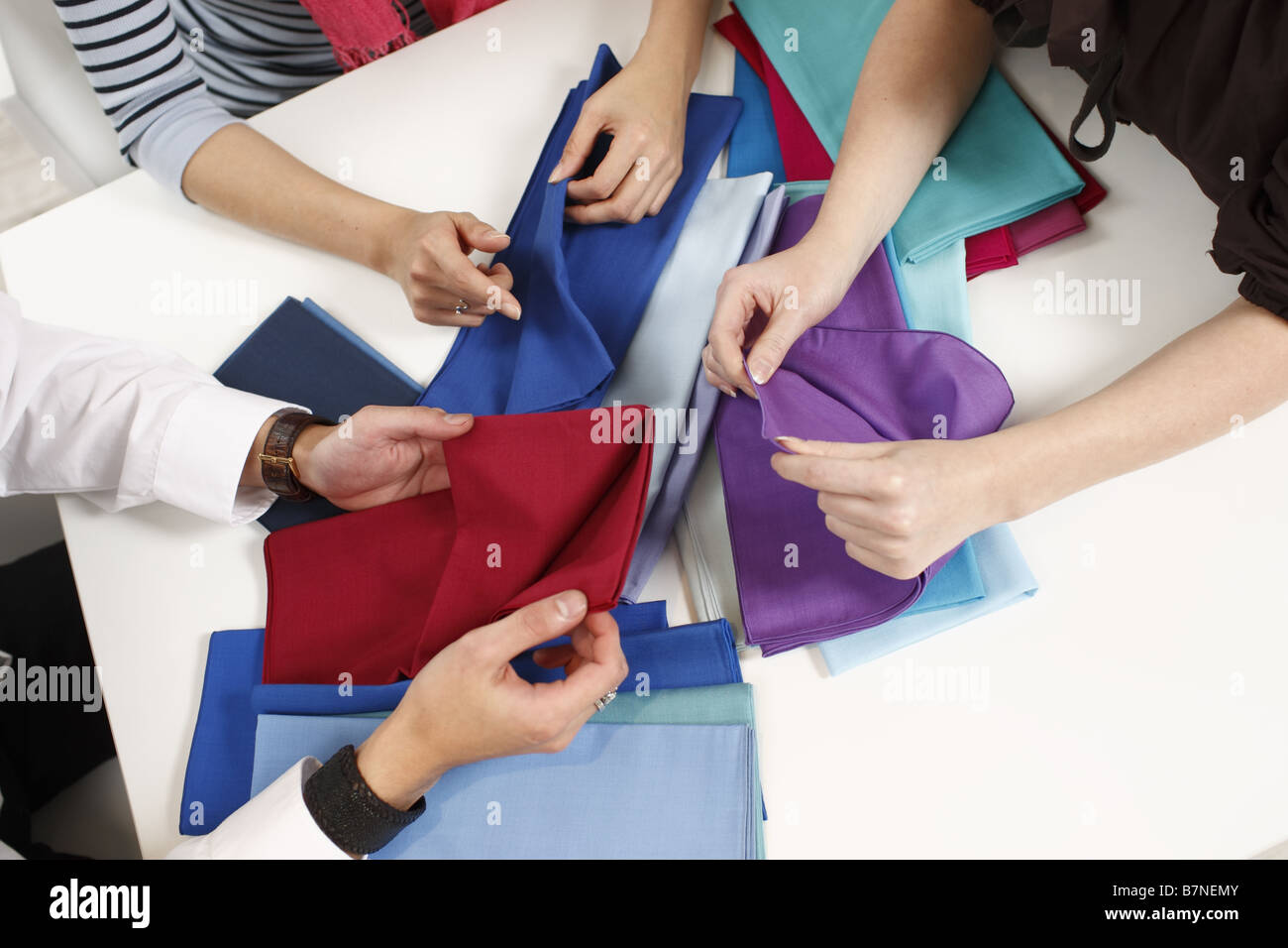 People selecting fabrics Stock Photo - Alamy