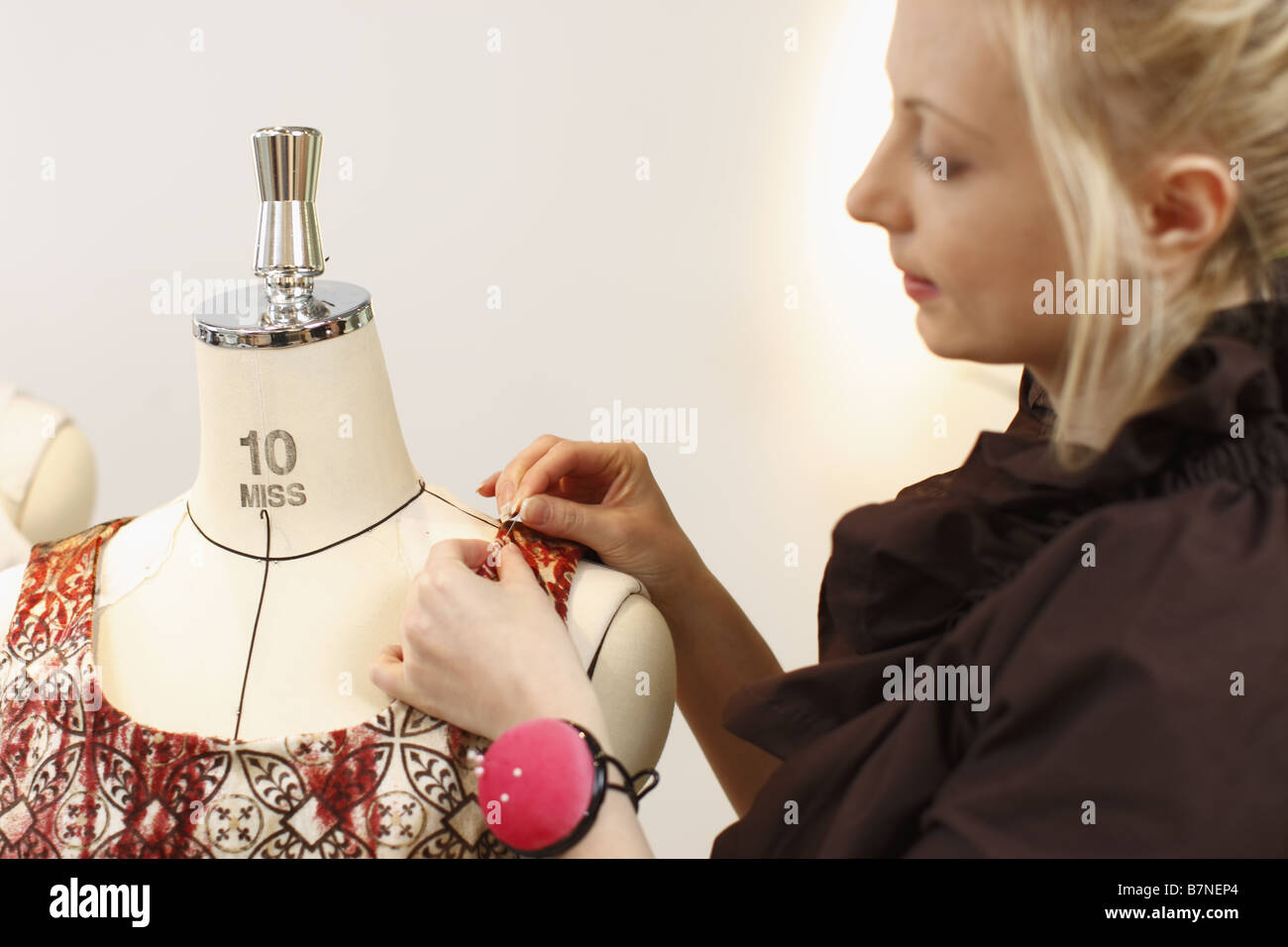 Young woman tailor mannequin hi-res stock photography and images - Alamy