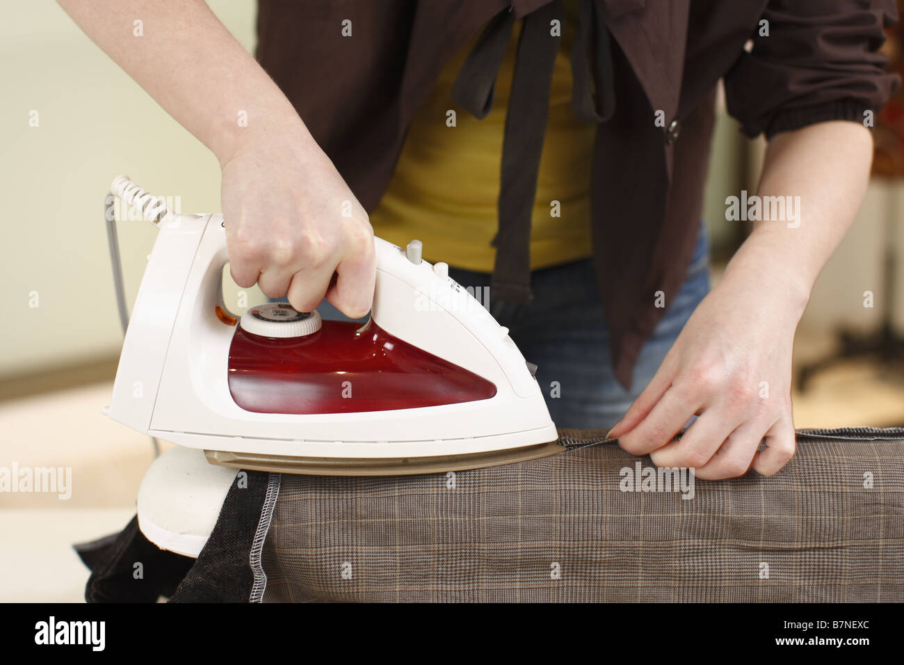 Pressing dress hi-res stock photography and images - Alamy