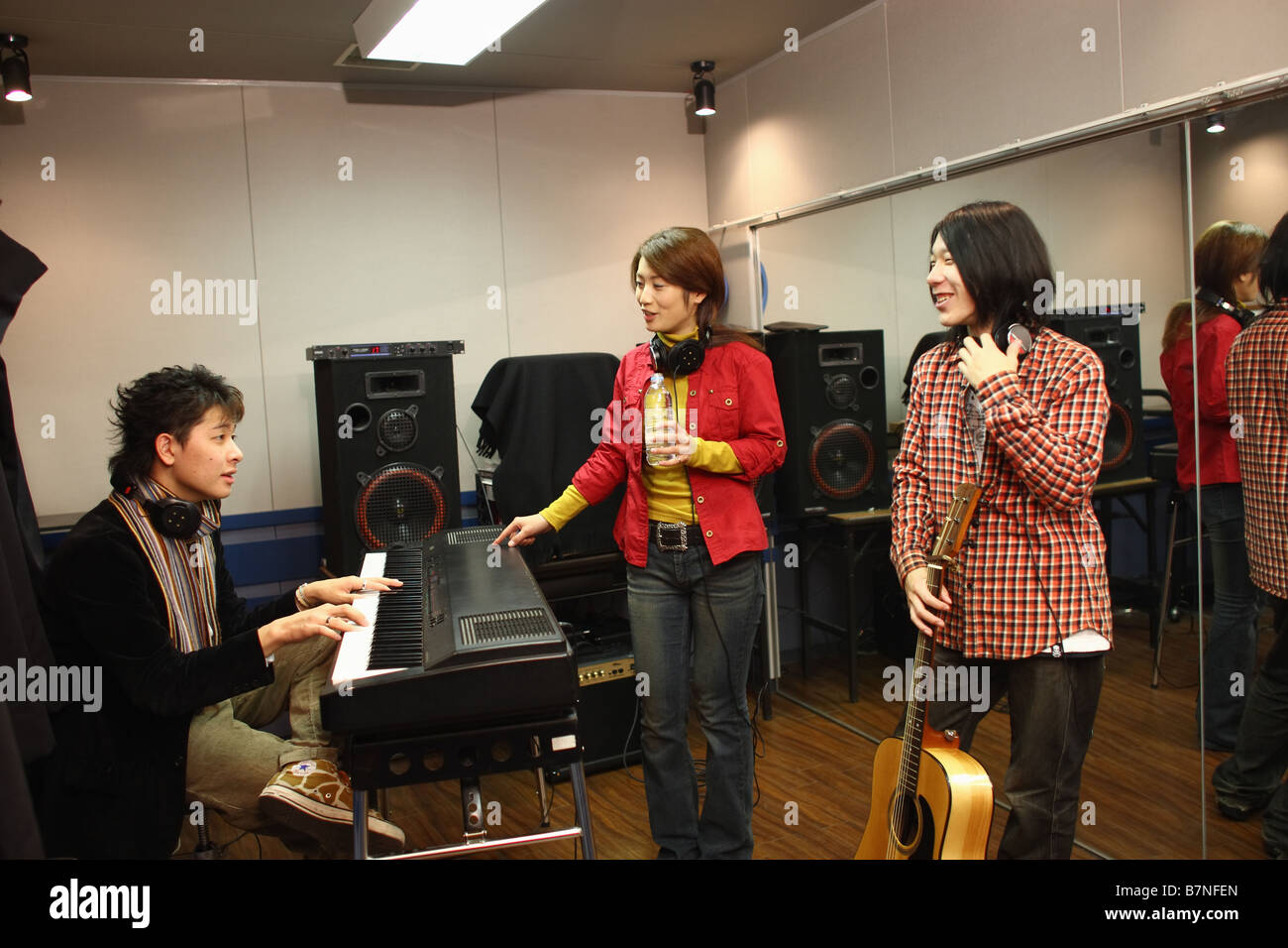 Young people in the recording studio Stock Photo - Alamy