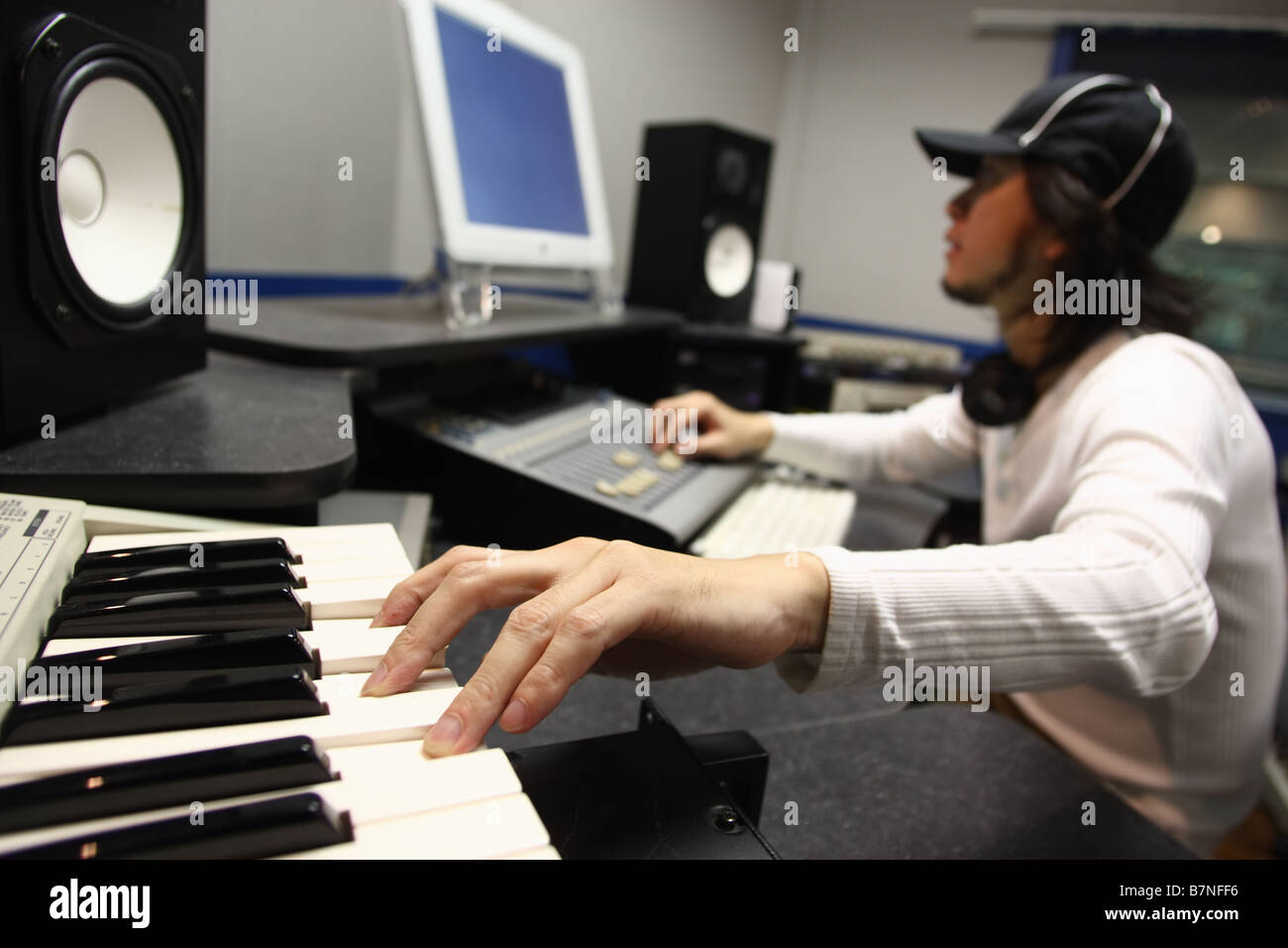 Man working with sound mixer Stock Photo - Alamy