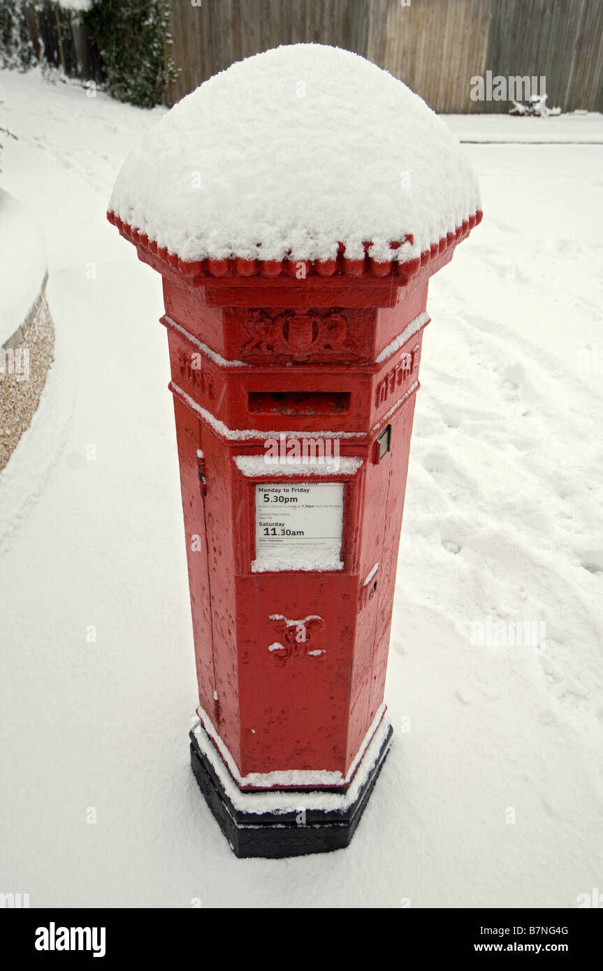 Snow covered victorian post box Stock Photo - Alamy