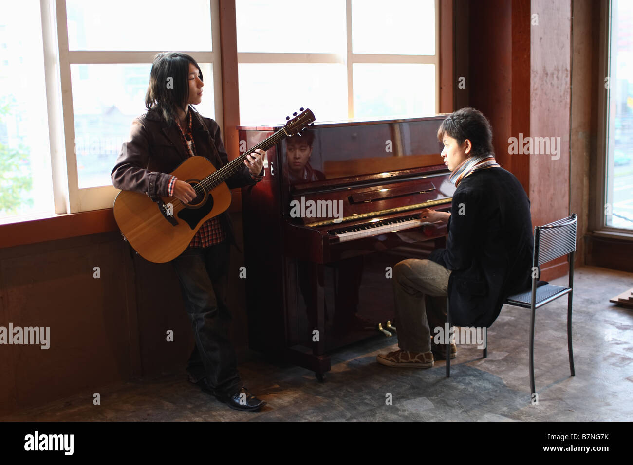 Young people playing instruments Stock Photo - Alamy