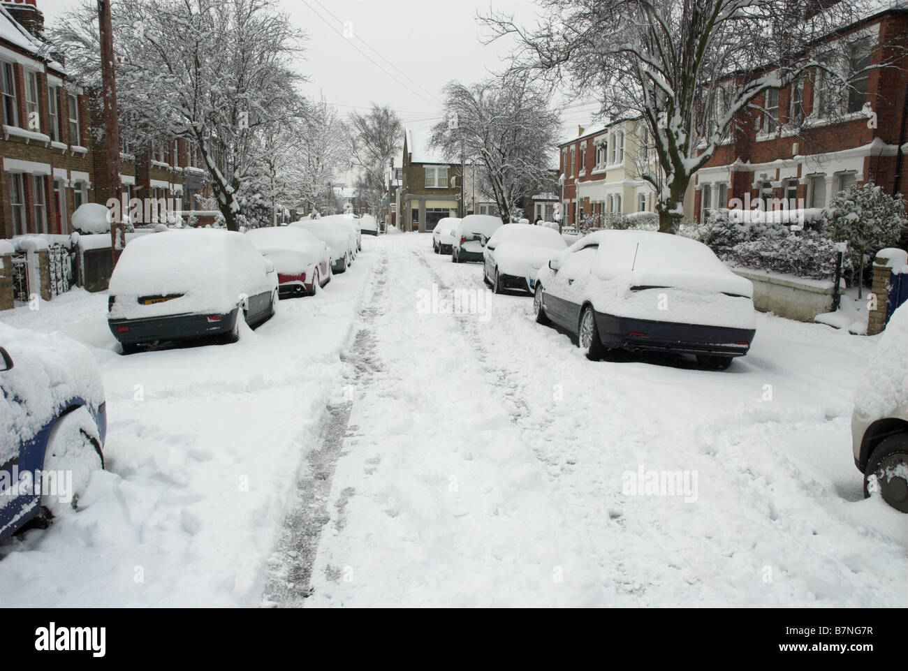 Snowy street in Wimbledon, London Stock Photo - Alamy