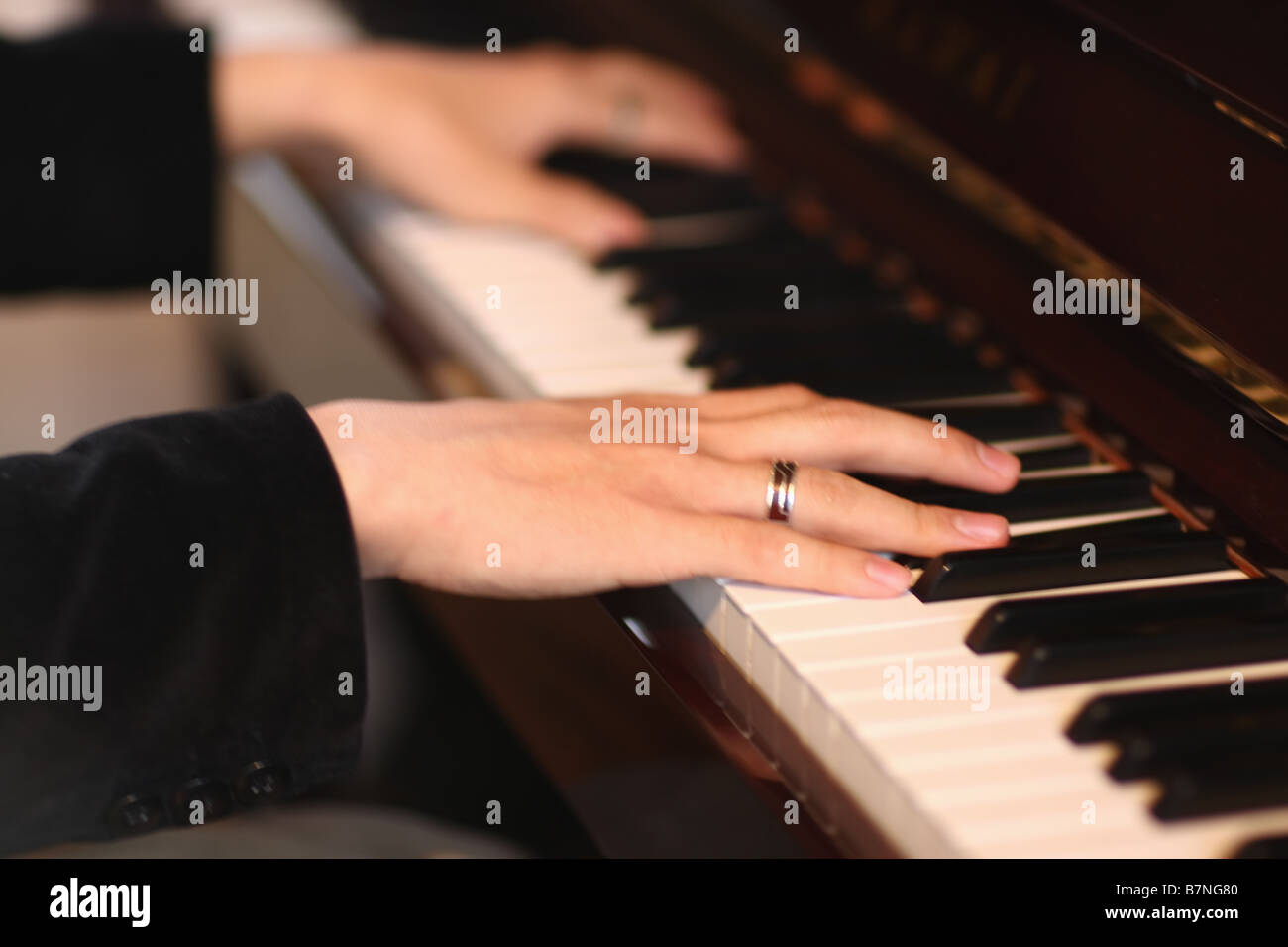 Playing the piano hi-res stock photography and images - Alamy