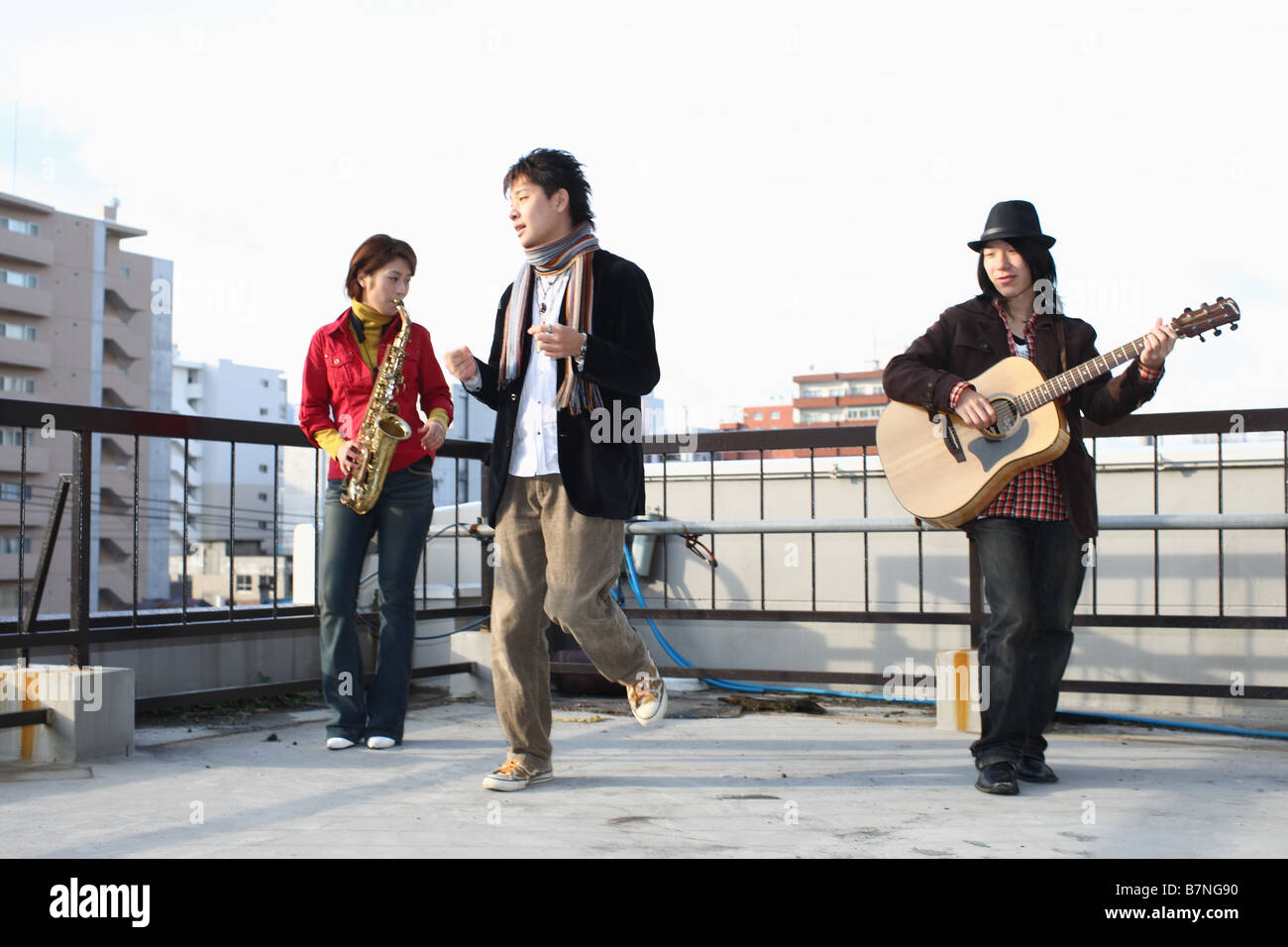 Young people playing instruments Stock Photo - Alamy