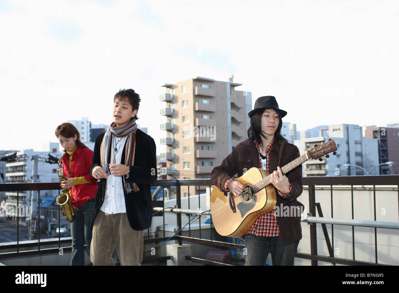 Playing instruments hi-res stock photography and images - Alamy