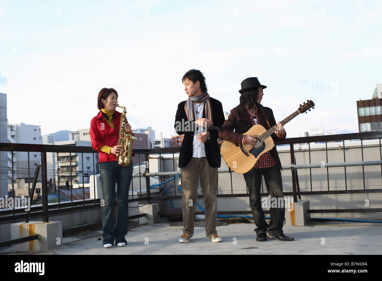 Young people playing instruments Stock Photo - Alamy