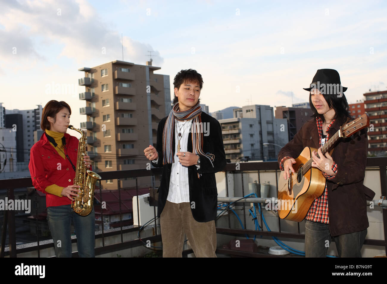 Young people playing instruments Stock Photo - Alamy