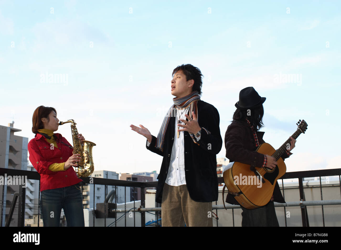 Young people playing instruments Stock Photo - Alamy