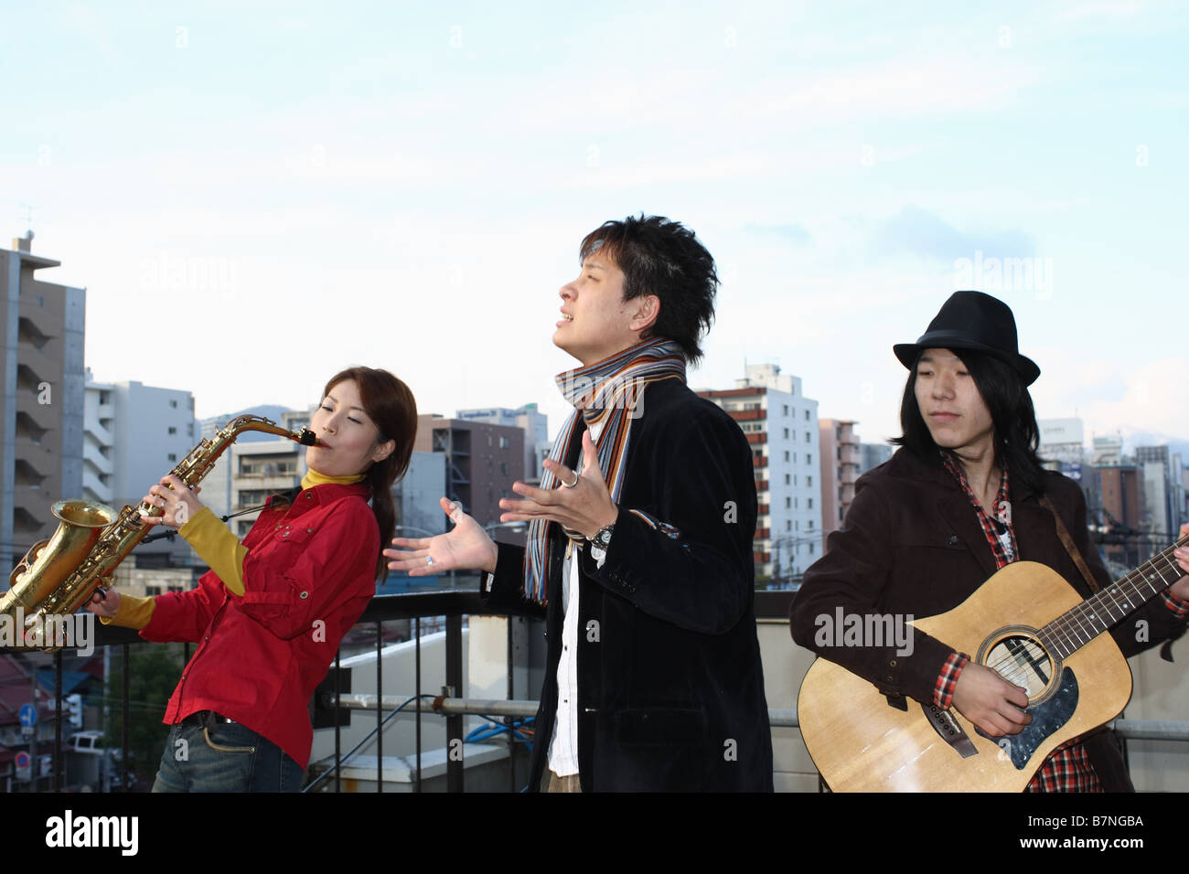 Young people playing instruments Stock Photo - Alamy