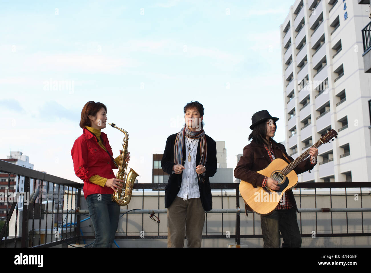 Young people playing instruments Stock Photo - Alamy