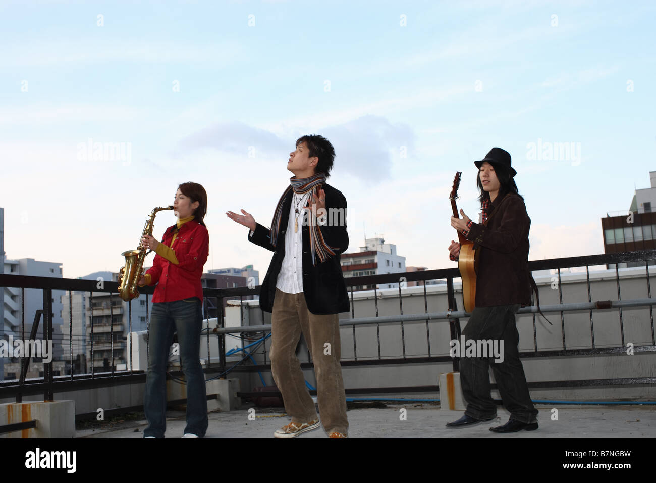 Young people playing instruments Stock Photo - Alamy
