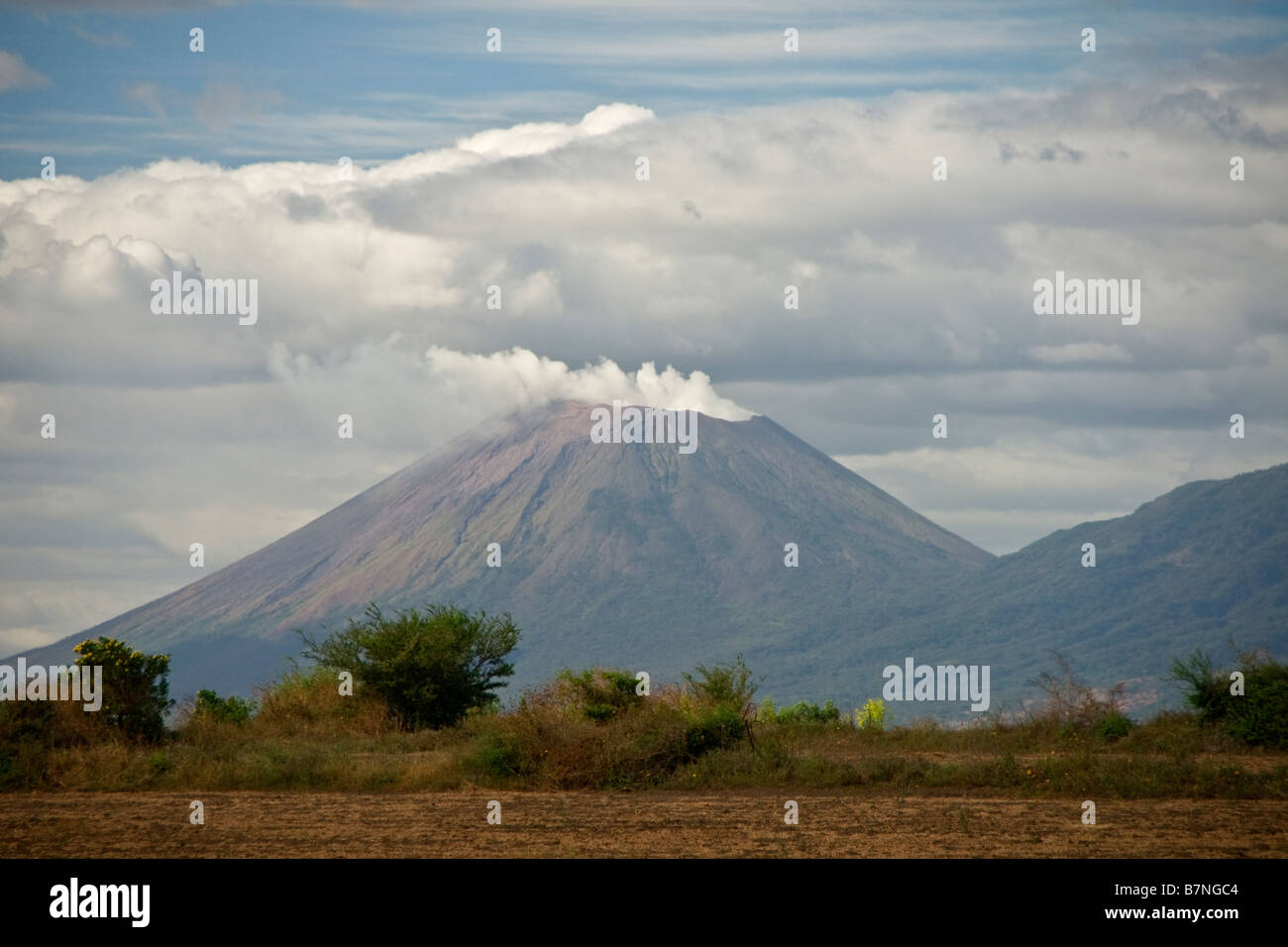 San Cristobal, active cone-shaped smoking volcano, is highest in ...